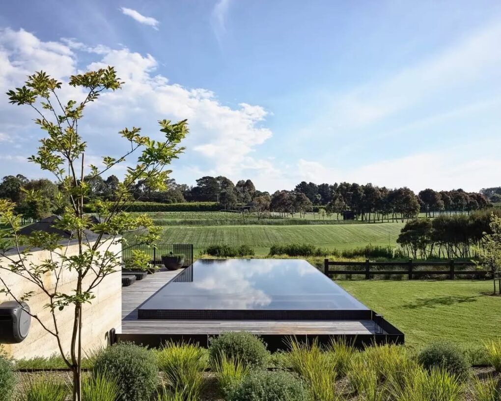 17 Splash & Bloom: Stunning Pool Garden Ideas that Feel Like Out of Town