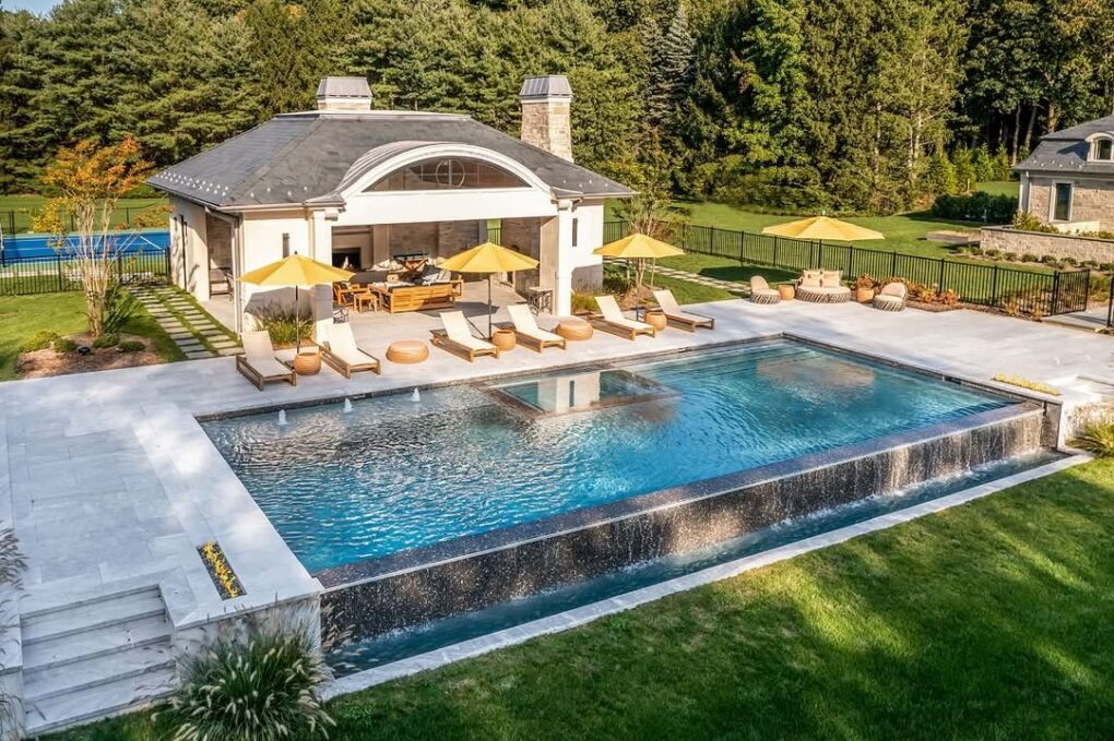 17 Splash & Bloom: Stunning Pool Garden Ideas that Feel Like Out of Town