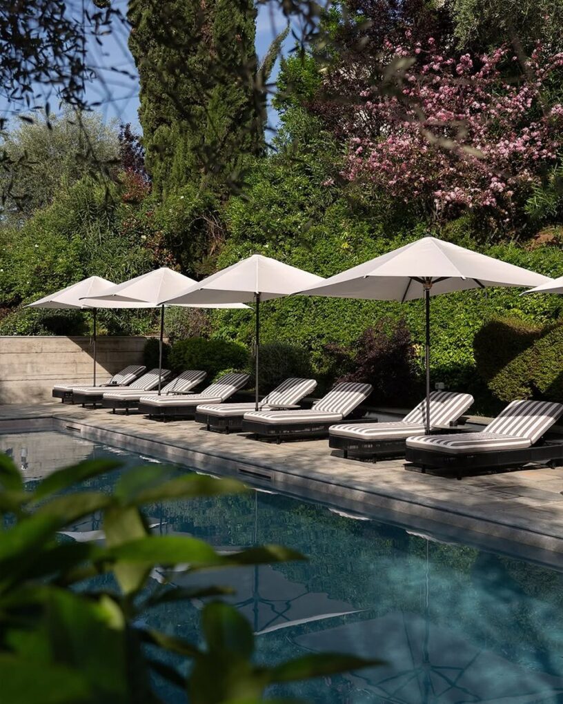 17 Splash & Bloom: Stunning Pool Garden Ideas that Feel Like Out of Town